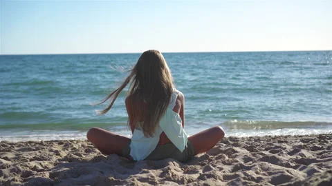 Adorable little girl at beach during sum... | Stock Video | Pond5