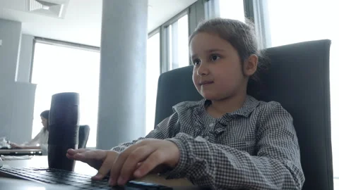 Adorable preschool child working on comp... | Stock Video | Pond5