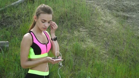 adorable slim lady listening music in he... | Stock Video | Pond5