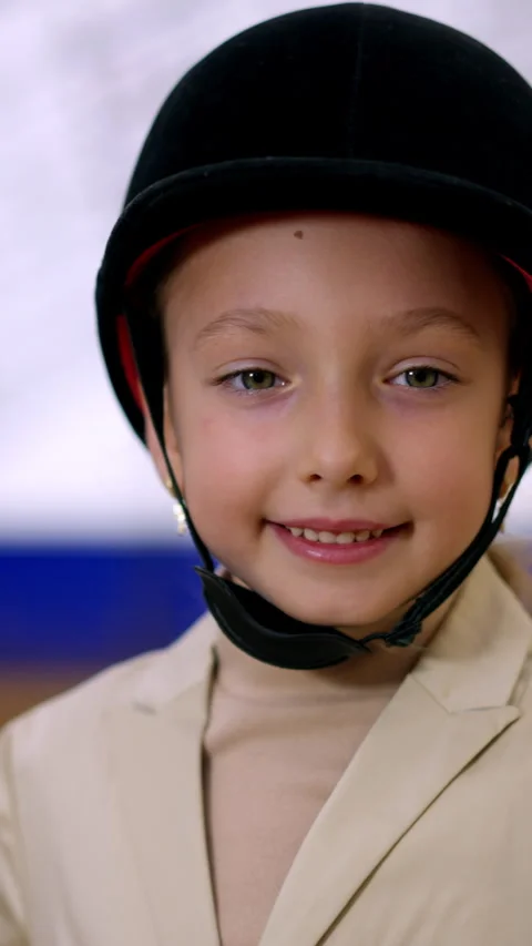 Adorable young kid wearing big black joc... | Stock Video | Pond5