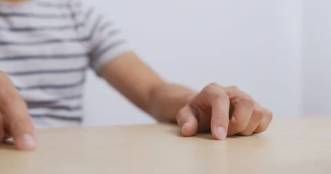 Adult man hand finger tapping on table | Stock Video | Pond5
