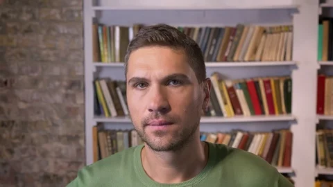 Adult man listens and gets surprised. Bo... | Stock Video | Pond5