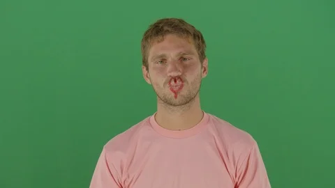 adult man making duck face with red lips... | Stock Video | Pond5