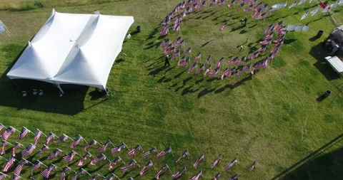 Aerial of 1000 American flags | Stock Video | Pond5