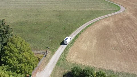 Aerial 4K footage of a car driving on th... | Stock Video | Pond5