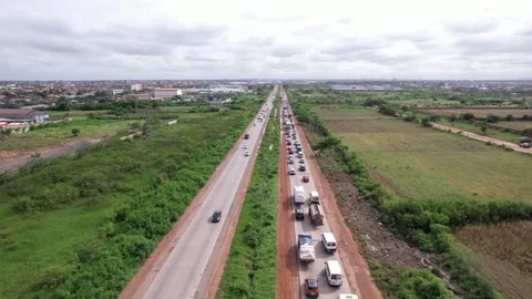 Aerial of Accra - Tema Motorway in Ghana... | Stock Video | Pond5