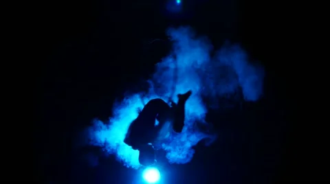 Aerial acrobat man on circus stage. Silh... | Stock Video | Pond5