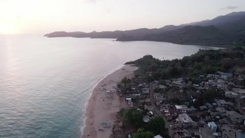 Aerial of beach next to rural African vi... | Stock Video | Pond5