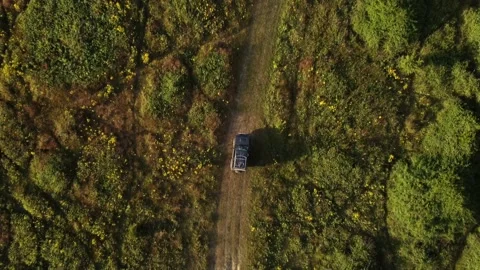 Aerial birds eye view 4x4 off road car d... | Stock Video | Pond5