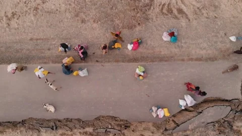 Aerial Birds Eye View Of People Carrying... | Stock Video | Pond5