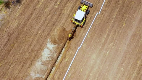 Aerial camera zooming in to an excavatio... | Stock Video | Pond5