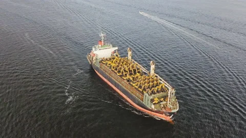 Aerial: Cargo ship in motion with constr... | Stock Video | Pond5