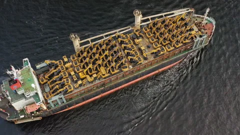 Aerial: Cargo ship in motion with constr... | Stock Video | Pond5