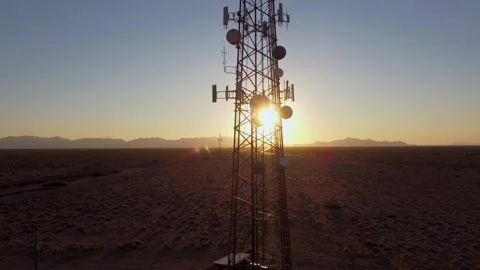 Aerial: Cell Tower at sunset in Arizona ... | Stock Video | Pond5