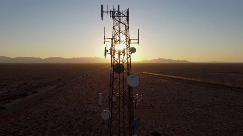 Aerial: Cell Tower at sunset in Arizona ... | Stock Video | Pond5