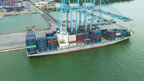 Aerial: containers loading on a cargo at... | Stock Video | Pond5