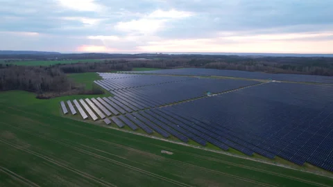 Aerial dolly over large solar field with... | Stock Video | Pond5