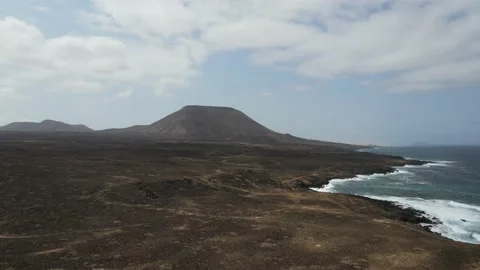 aerial drone shot of a massive volcano i... | Stock Video | Pond5