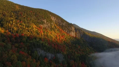 Aerial of fall foliage along an Adironda... | Stock Video | Pond5