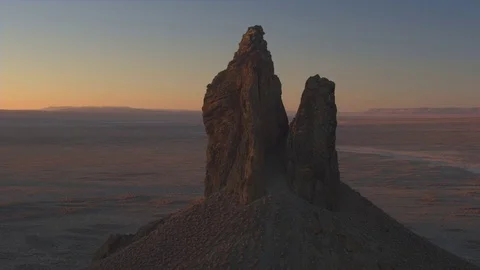 AERIAL Flying around Boars tusk volcano ... | Stock Video | Pond5