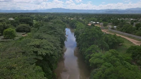 Aerial flyover natural river border betw... | Stock Video | Pond5