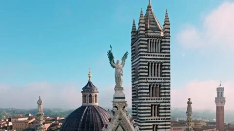 Aerial focused on an angel statue at top... | Stock Video | Pond5