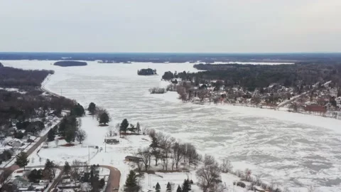 Aerial, frozen Wisconsin River during wi... | Stock Video | Pond5