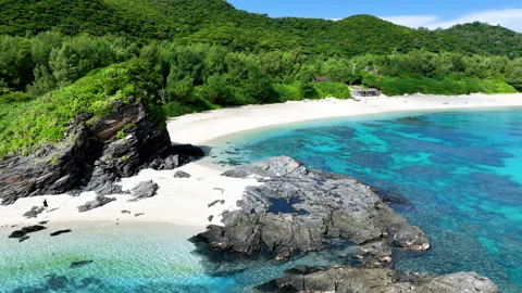 Aerial Furuzamami Beach on Zamami island... | Stock Video | Pond5