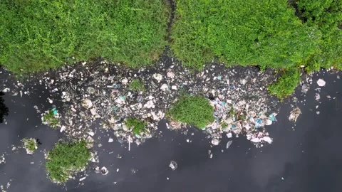 Aerial look down debris contamination al... | Stock Video | Pond5