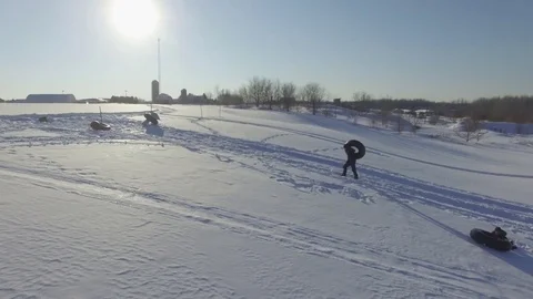 aerial man walking up the winter activit... | Stock Video | Pond5