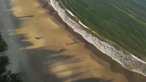 Aerial orbit shot of family having fun o... | Stock Video | Pond5