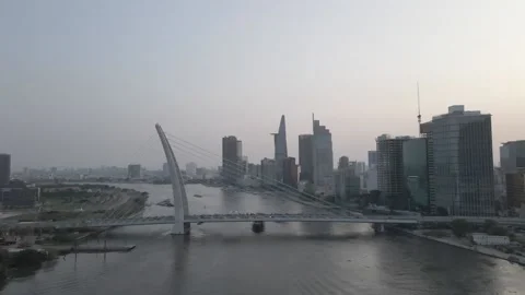 Aerial over Ba Son bridge spanning Saigo... | Stock Video | Pond5