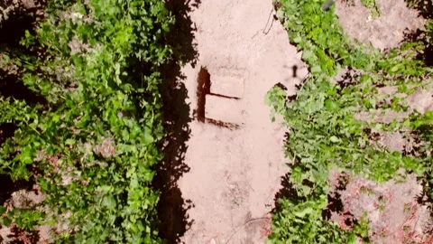 Aerial overhead dolly in view of a dirt ... | Stock Video | Pond5