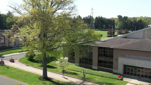 Aerial Pan View of Alumni Gymnasium at R... | Stock Video | Pond5