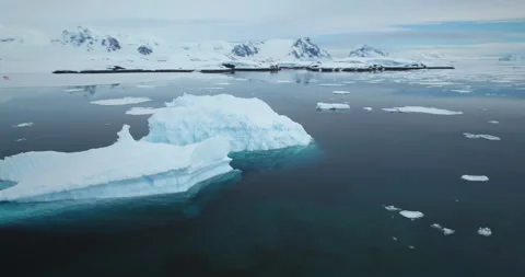 Aerial panorama Antarctic iceberg drift ... | Stock Video | Pond5
