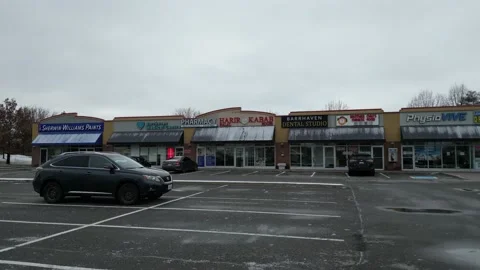 Aerial ped up tracing shot store fronts-... | Stock Video | Pond5