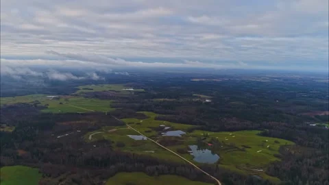 Aerial- Plane side POV of beautiful land... | Stock Video | Pond5