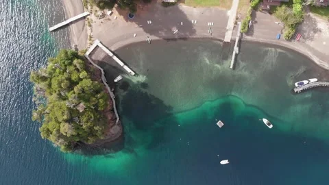 Aerial of protected, crystal clear bay i... | Stock Video | Pond5