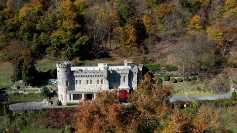 Aerial pull back from castle to reveal t... | Stock Video | Pond5