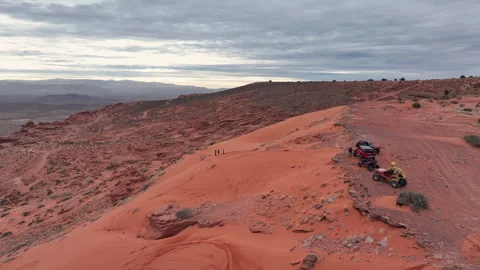 Aerial red rock sand cliff off road vehi... | Stock Video | Pond5