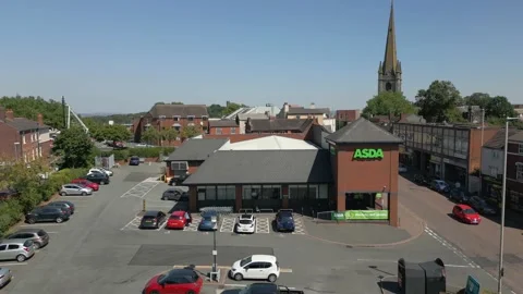 Aerial reveal of Asda supermarket in Dud... | Stock Video | Pond5