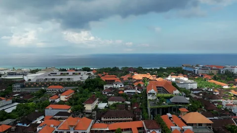 Aerial reveal of Kuta Skyline in Bali, I... | Stock Video | Pond5