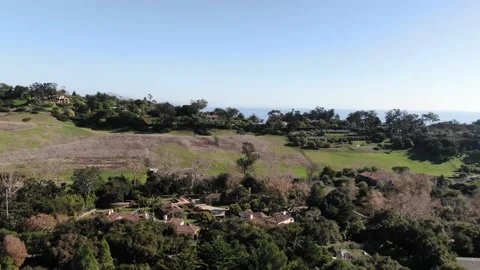 Aerial reveal from Montecito golf course... | Stock Video | Pond5