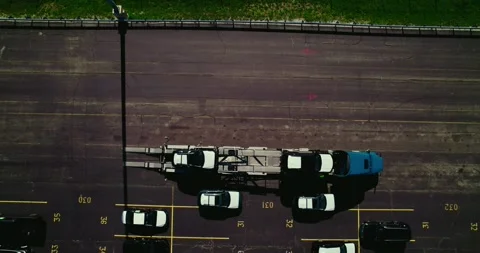 Aerial rising top view of a car carrier ... | Stock Video | Pond5