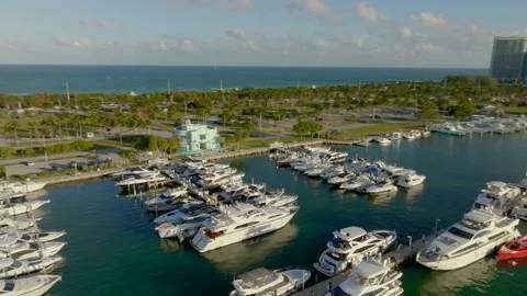 Aerial rising whip pan Miami Beach boats... | Stock Video | Pond5