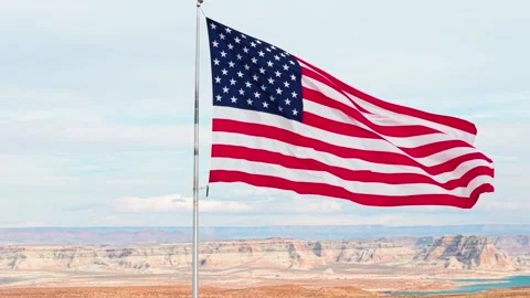 Aerial rotation around American flag wit... | Stock Video | Pond5