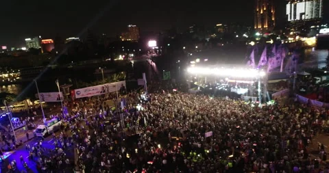 Aerial shot for crowd in front of stage ... | Stock Video | Pond5