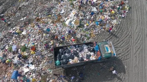 Aerial Shot Of Dump Truck And Garbage In... | Stock Video | Pond5