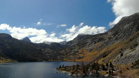 Aerial Shot of Fall Foliage by Alpine La... | Stock Video | Pond5