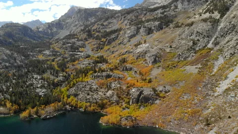 Aerial Shot of Fall Foliage by Alpine La... | Stock Video | Pond5